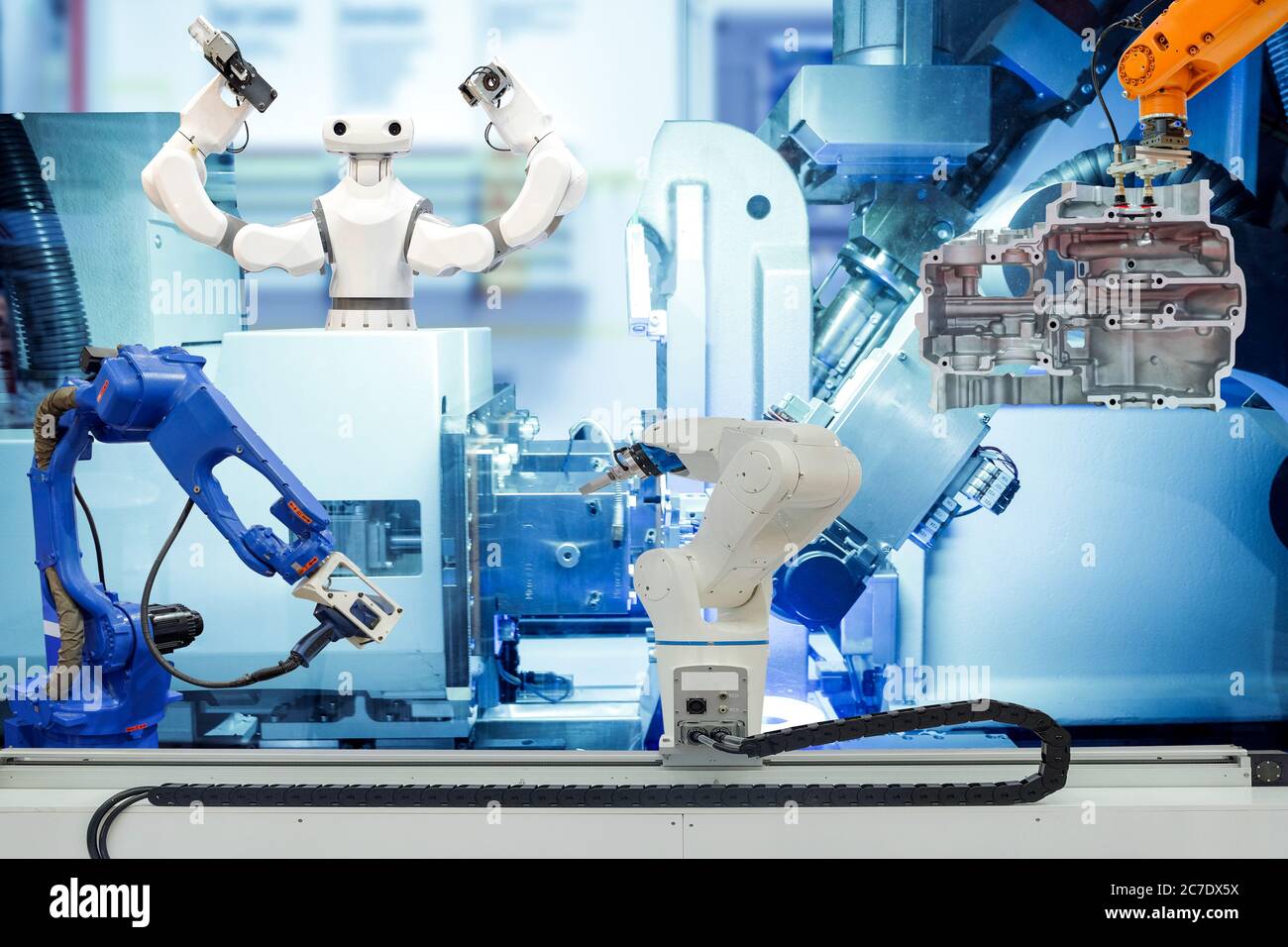 Industrial robotics working with auto parts on smart factory on blue ... Industrial robotics working with auto parts on smart factory on blue ...