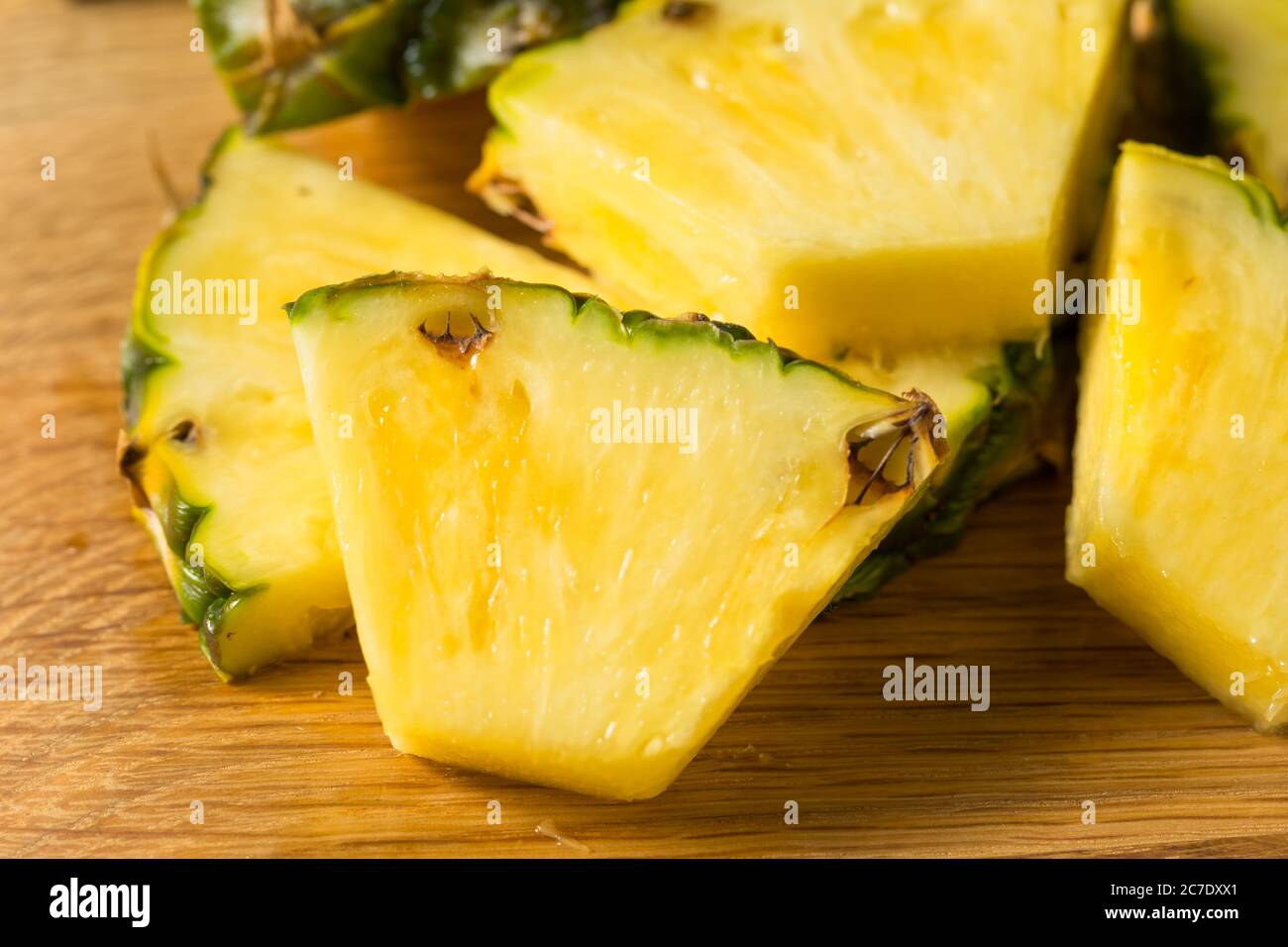 Raw Yellow Organic PIneapple Slices Ready to Eat Stock Photo - Alamy