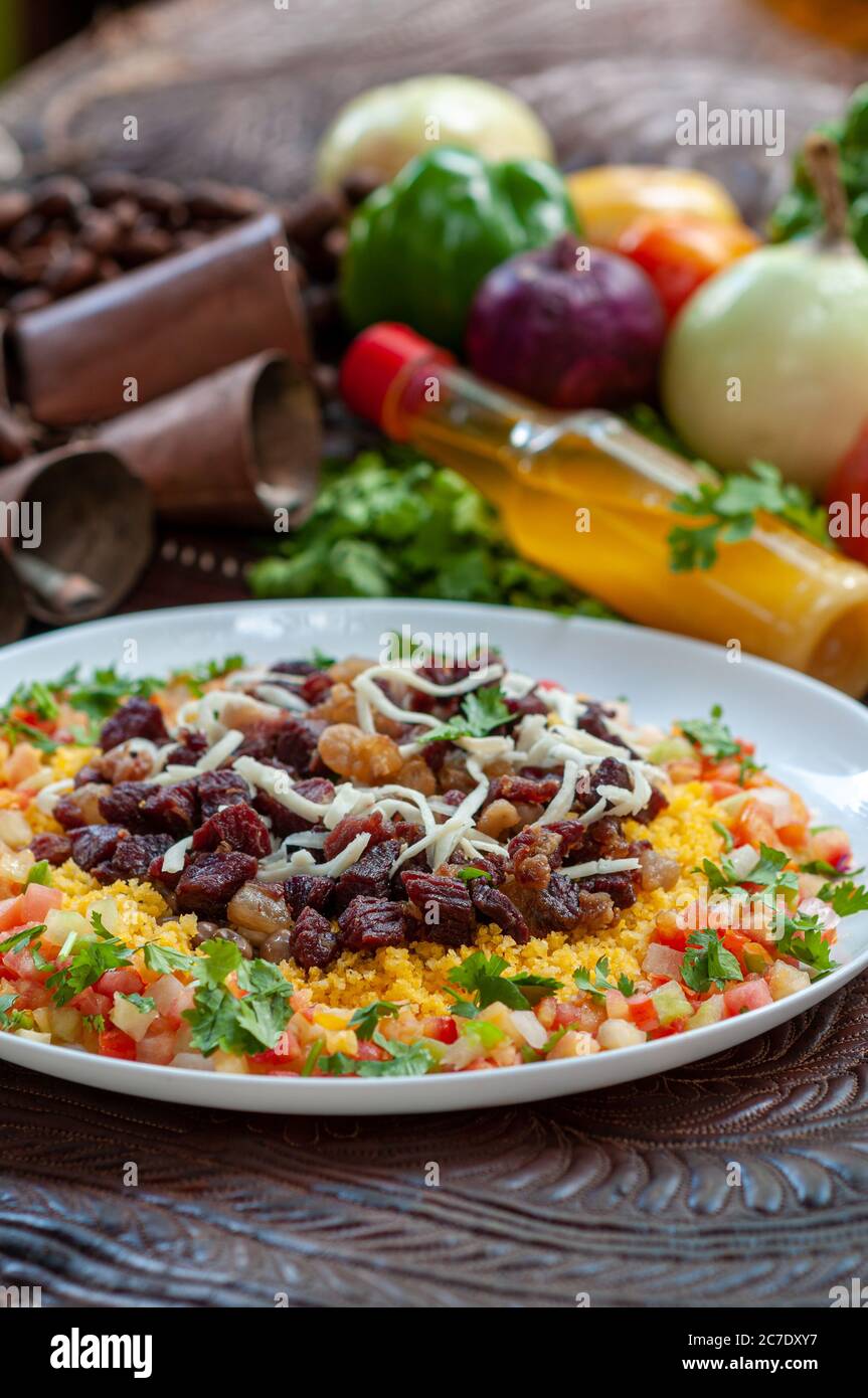 Traditional dish of popular Brazilian cuisine. Made with corn couscous ...