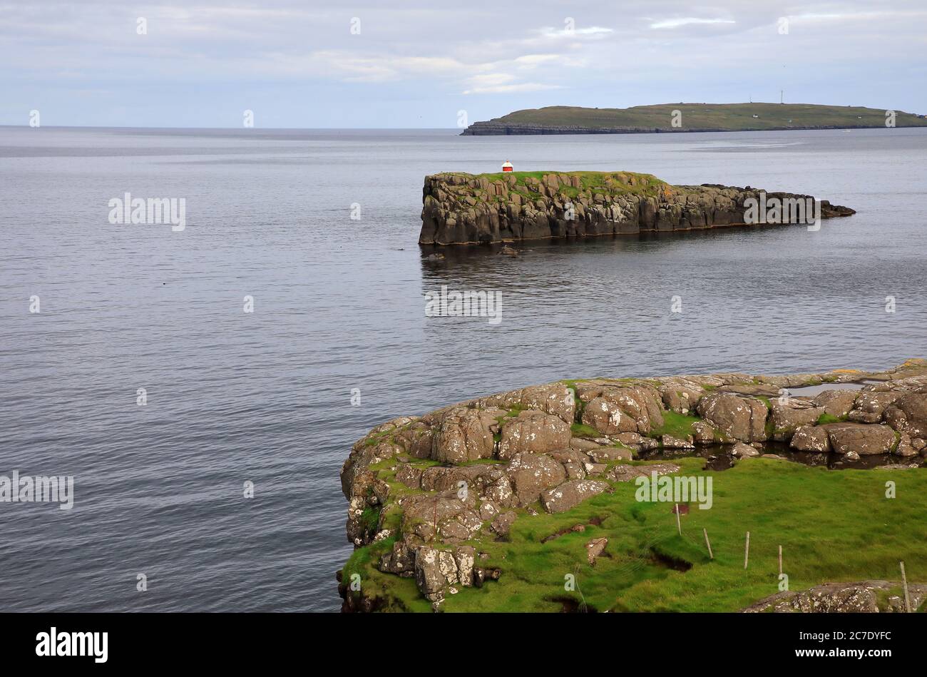 The view of Hoyviksholmur Island and Nolsoy Island in the distance with ...