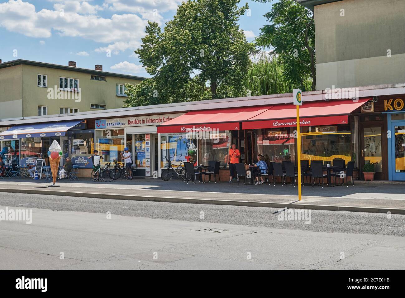Berlin, Germany - July 14, 2020: Shop facades in a small shopping ...