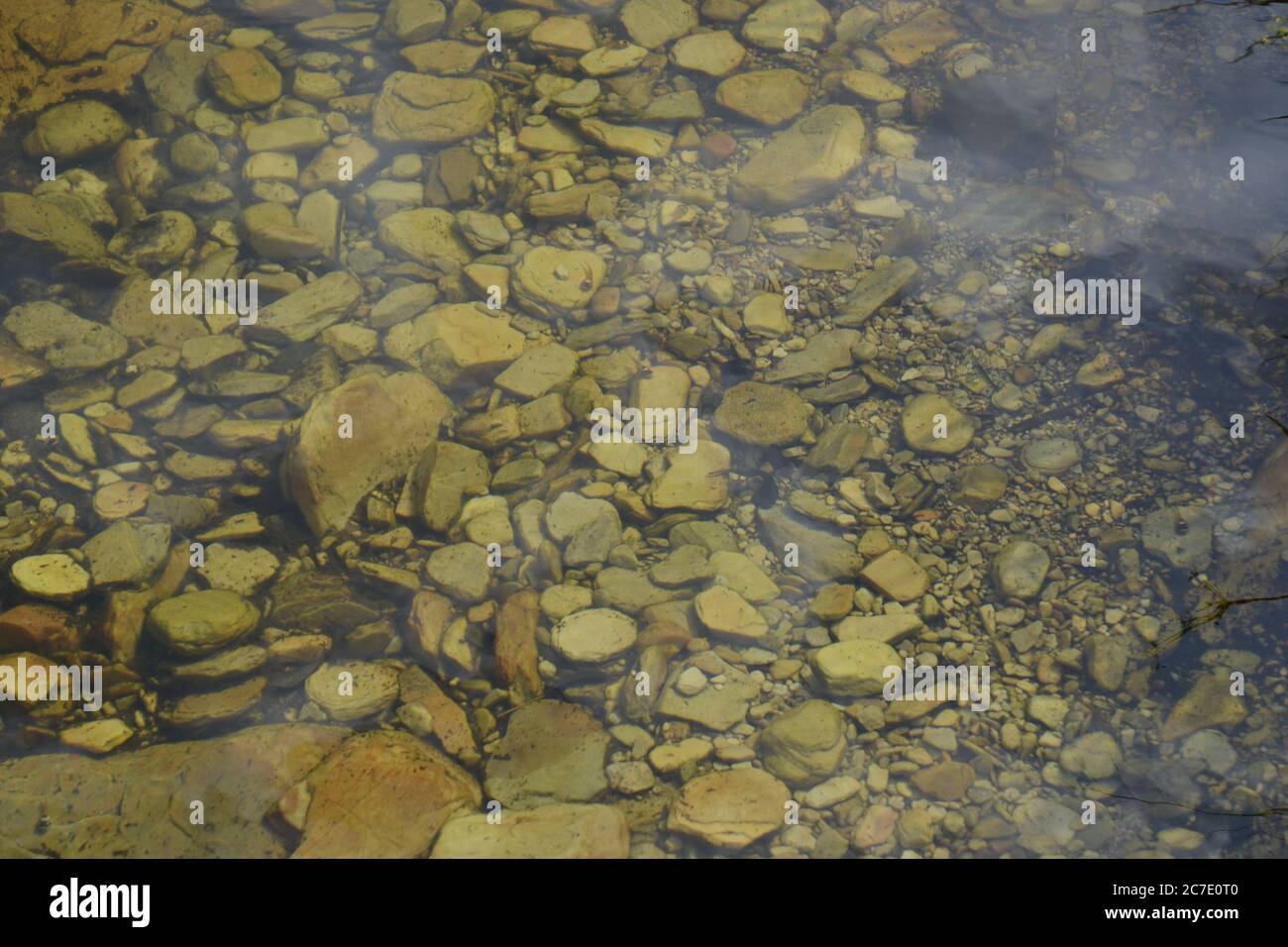 Fresh water river in Brazil in dry season, with rock background in ...