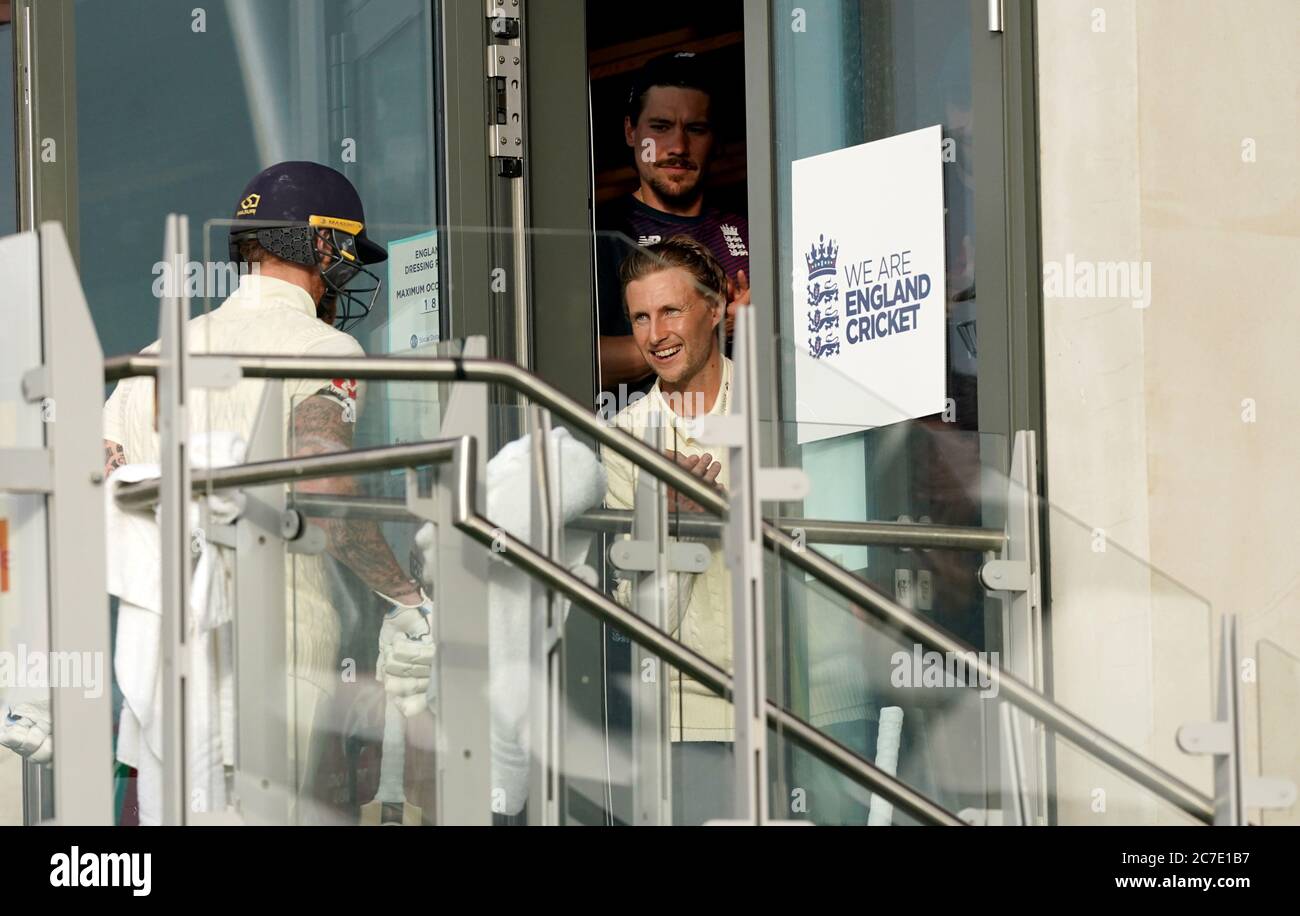 England's Joe Root smiles as Ben Stokes (left) returns to the dressing ...