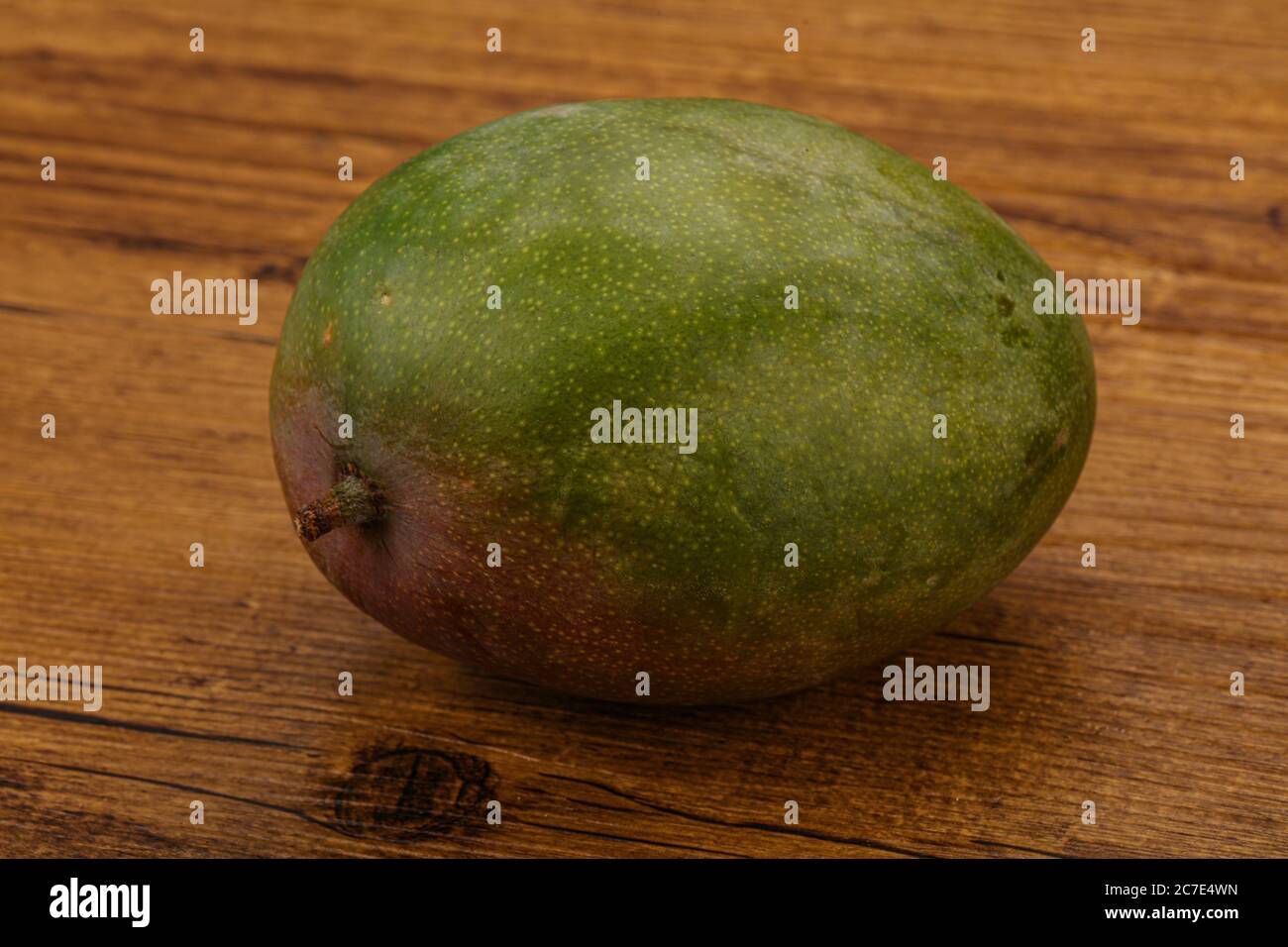Tropical fruit - Green sweet tasty mango Stock Photo - Alamy