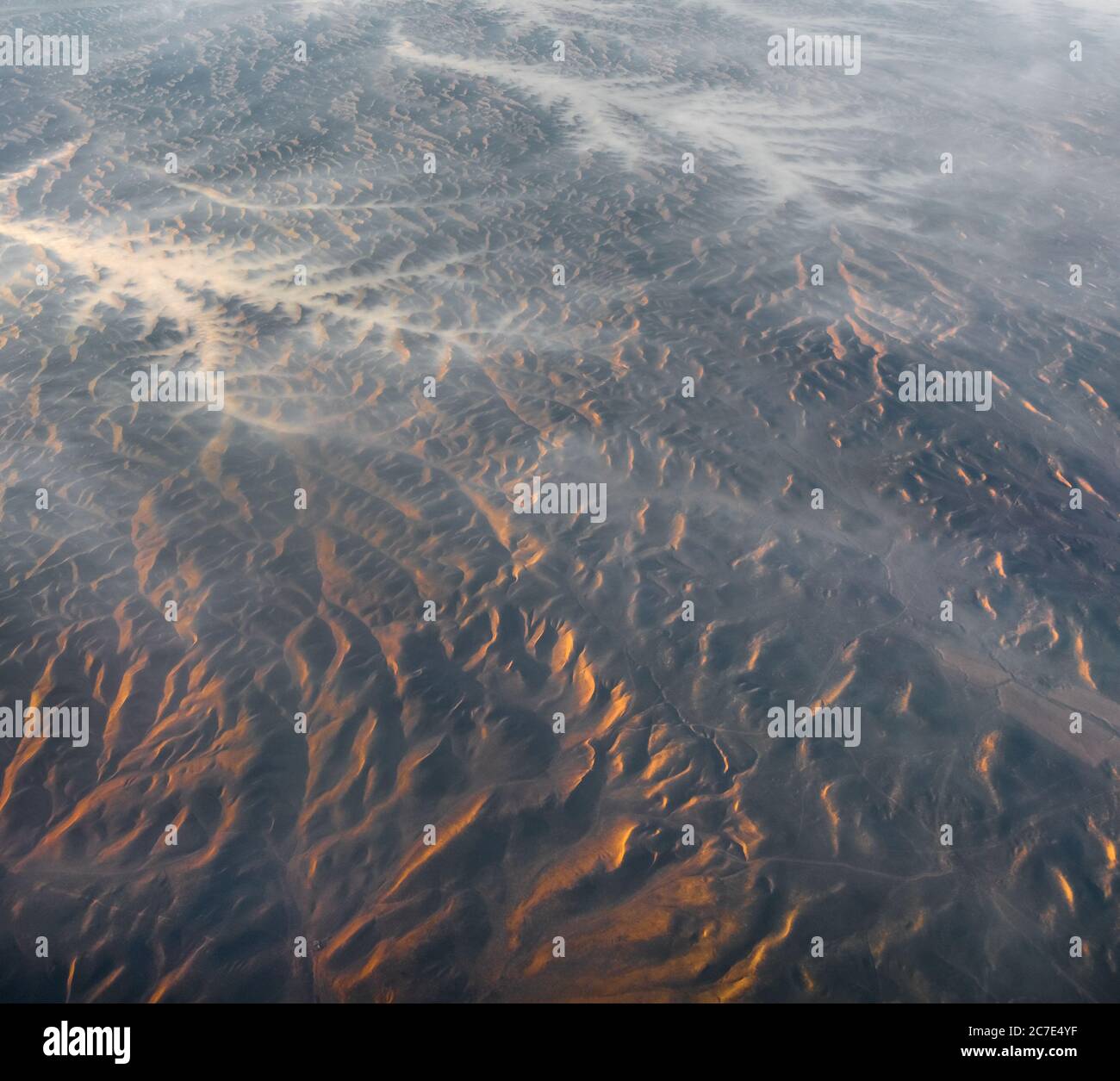 Aerial View from an Airplane. Flying above Beautiful Land at Sunrise ...