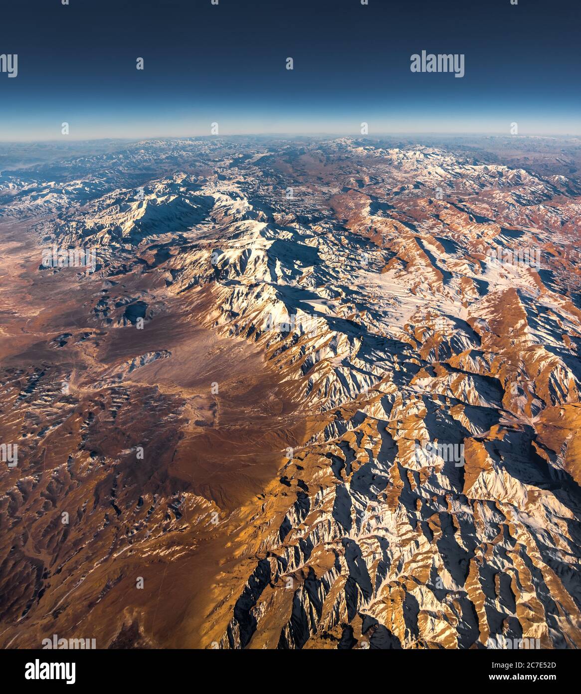 Aerial View from an Airplane. Flying above Beautiful Land at Sunrise ...