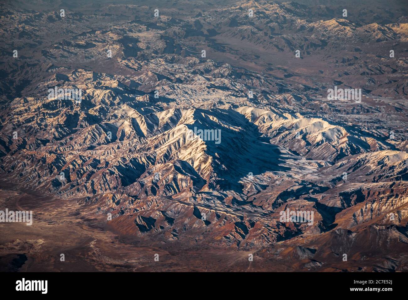 Aerial View from an Airplane. Flying above Beautiful Land at Sunrise ...