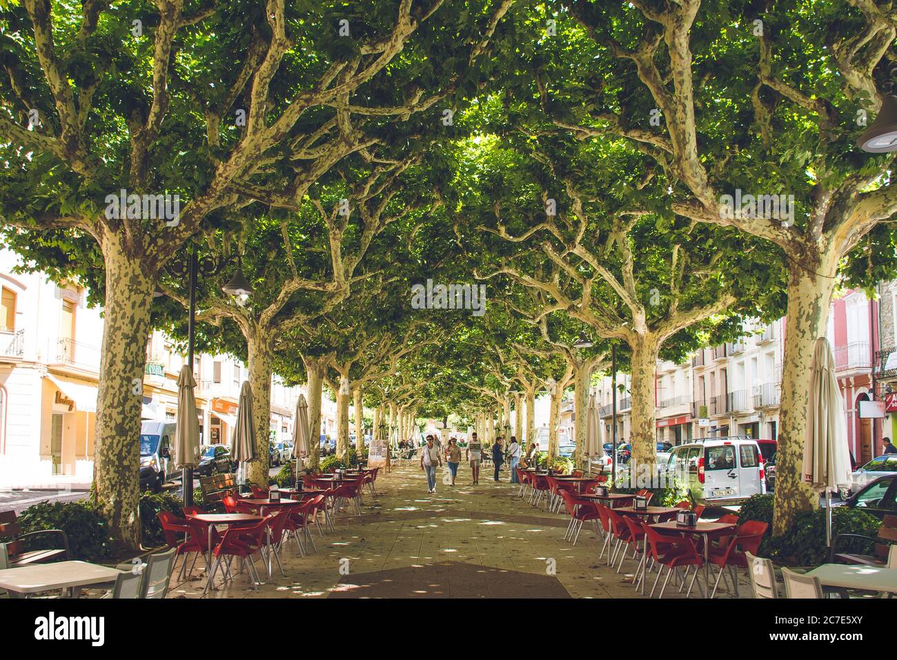 TREMP, SPAIN - Aug 18, 2018: Urban boulevard with chairs and tables ...