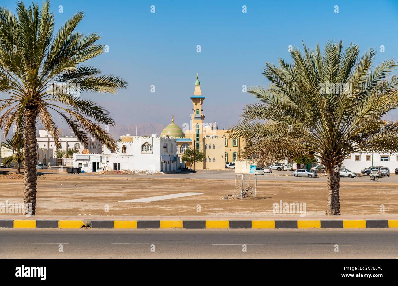Sur Cityscape with mosque and palms in a sunny day, Sultanate of Oman ...