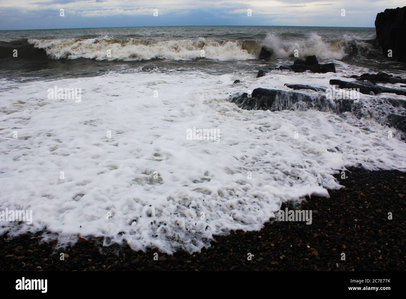 Stormy seascape, waves and wind in the black sea of Georgia. Drops ans ...