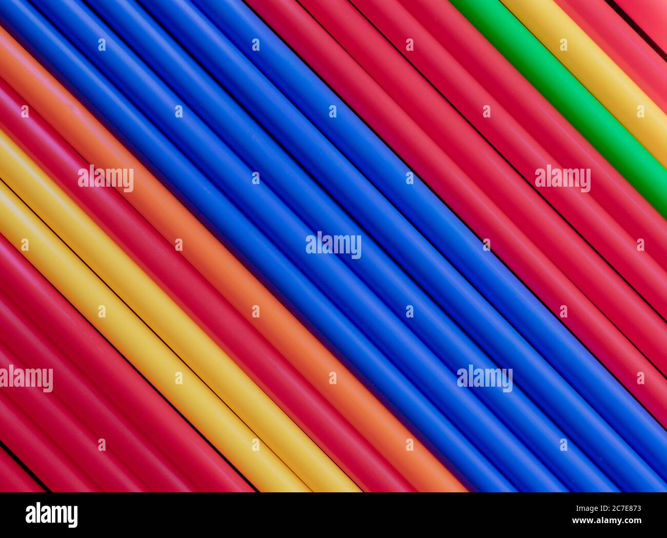 Colorful plastic tubes straws blue center diagonal background Stock ...