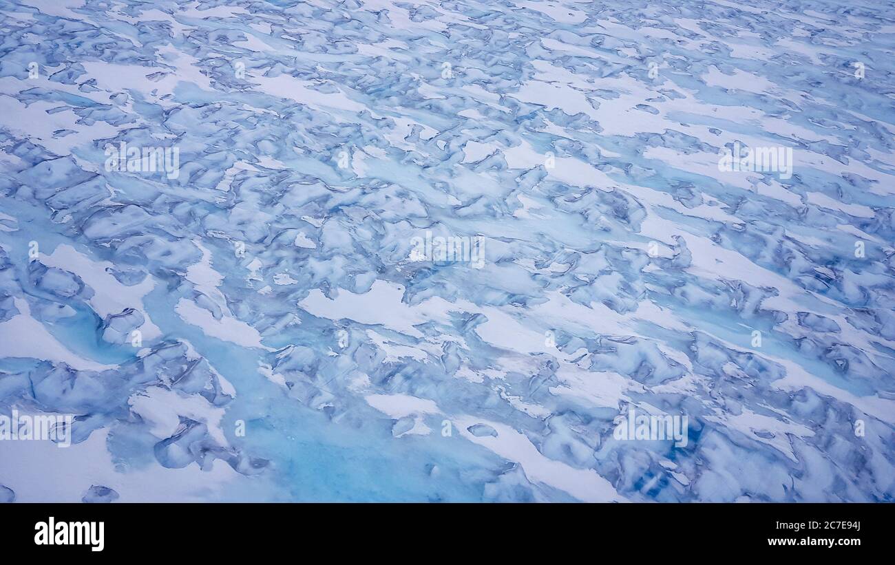 Wide aerial of glacier in greenland with glacial rivers and lakes Stock ...