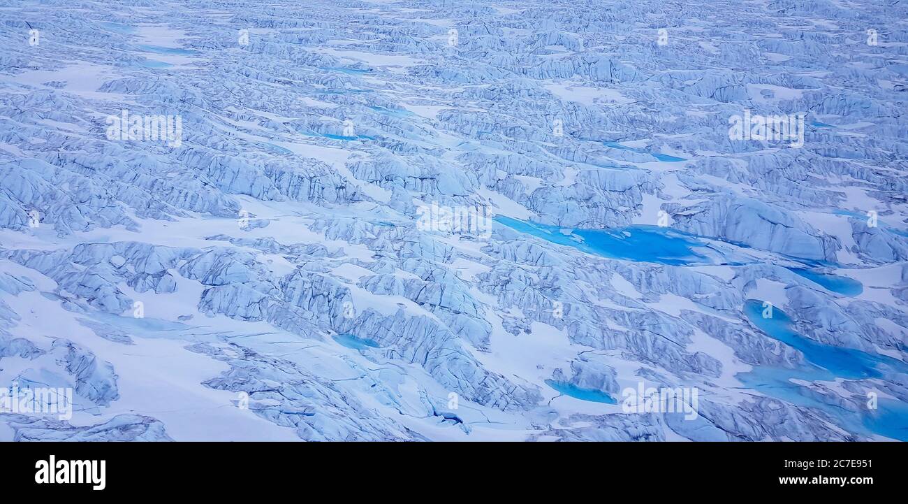 Wide aerial of glacier in greenland with glacial rivers and lakes Stock ...