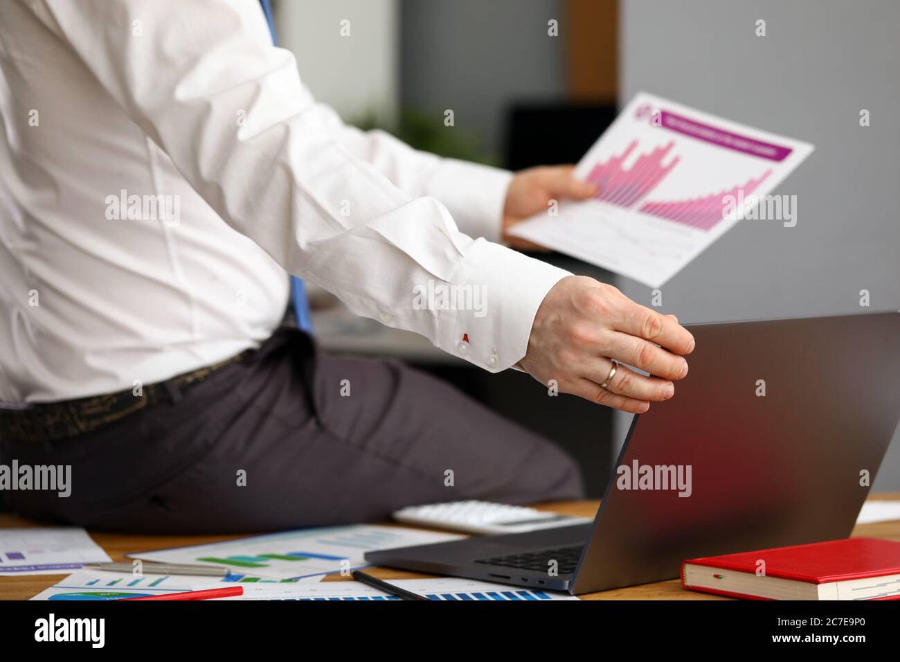 Man making statistics data Stock Photo - Alamy