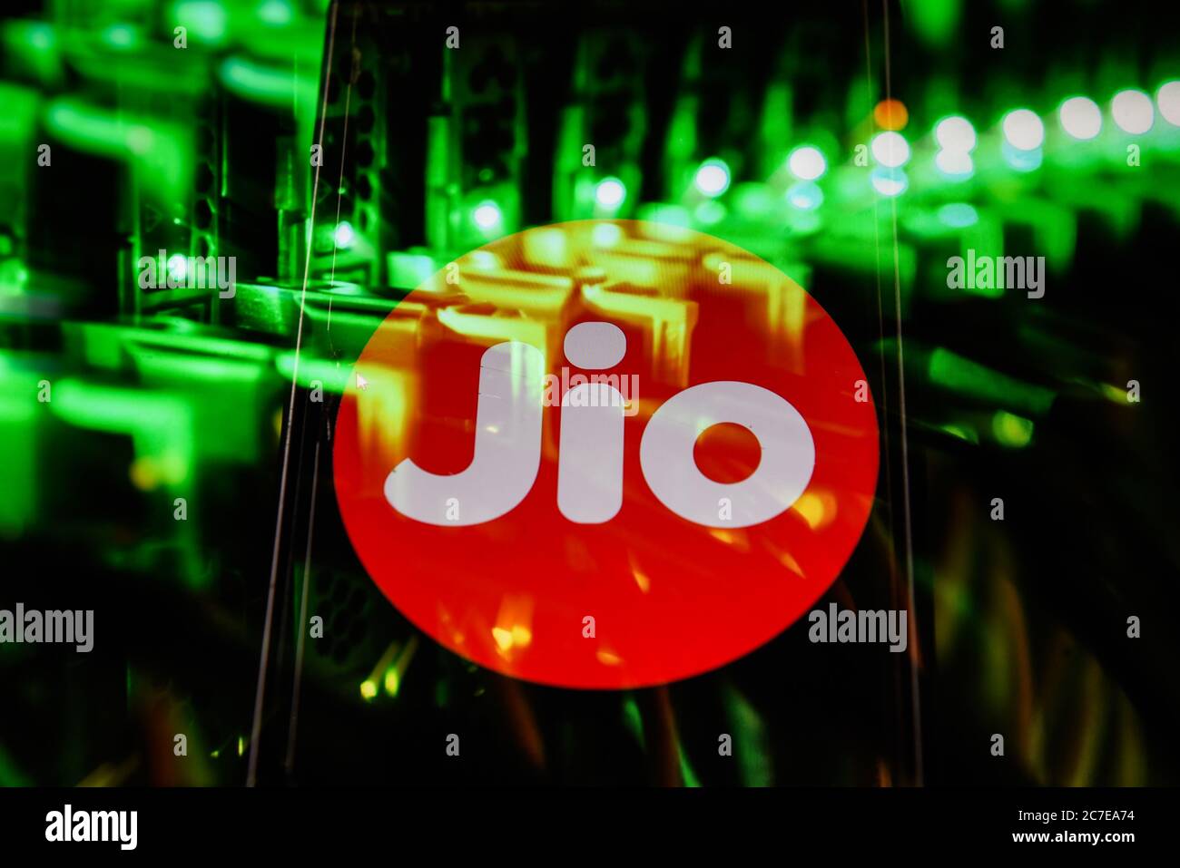 In this photo illustration a multiple exposure image shows a Jio logo ...