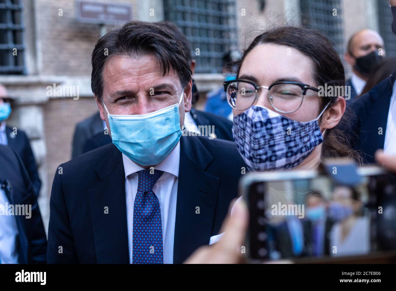 Prime Minister, Giuseppe Conte takes a selfie with his supporter after ...