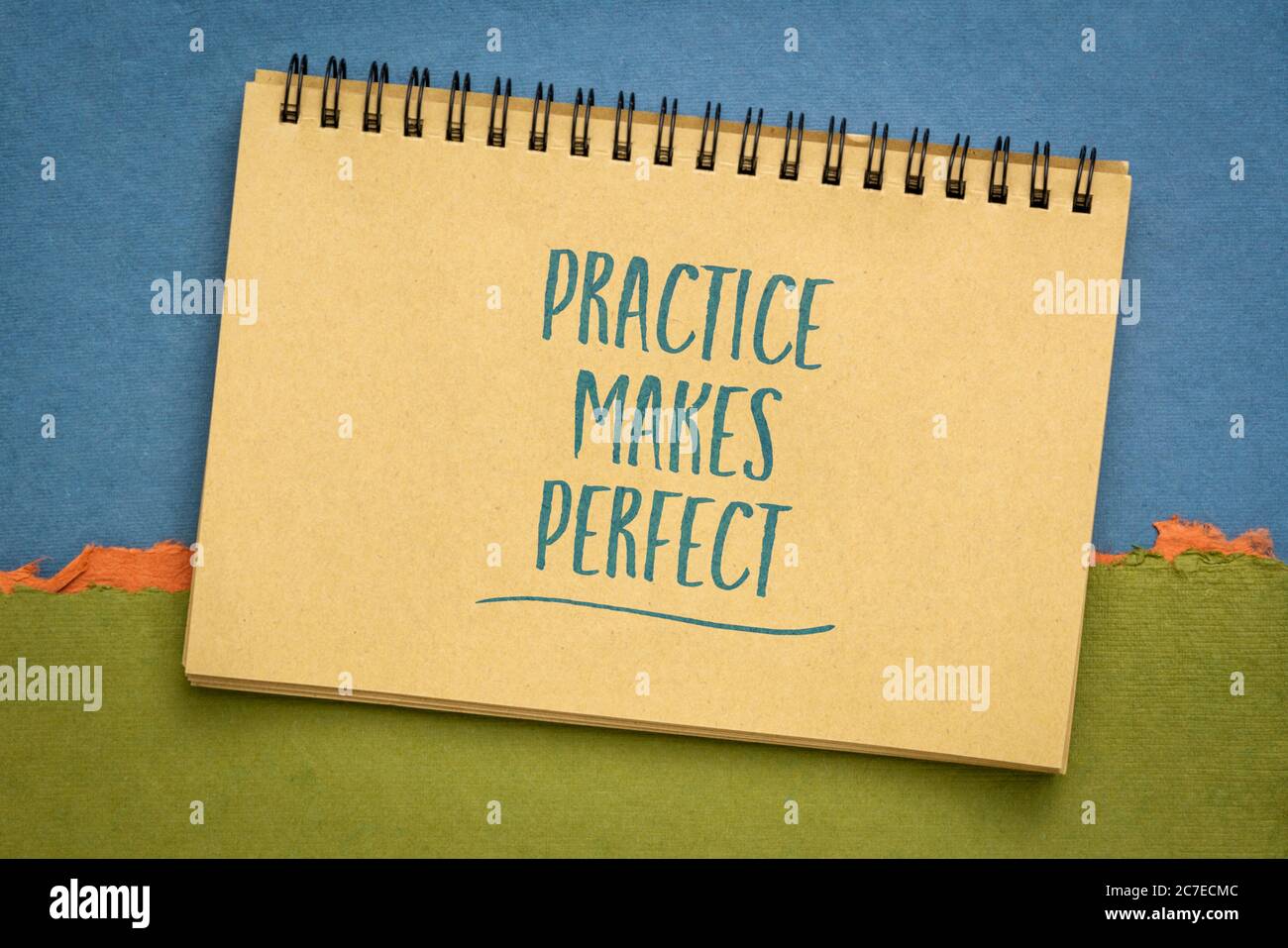 practice makes perfect - a motivational slogan in a spiral sketchbook ...