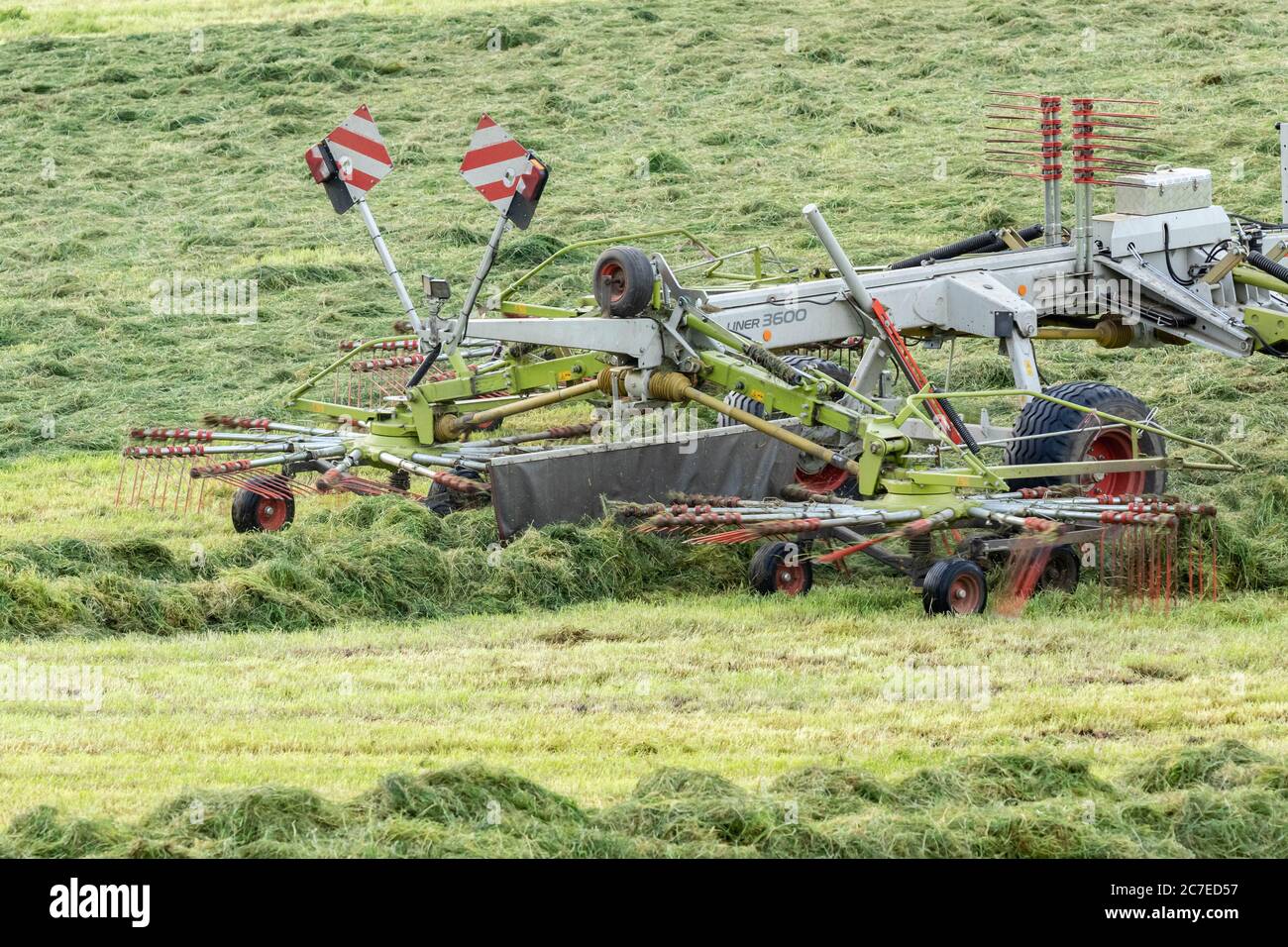 Farmers mixing grass hi-res stock photography and images - Alamy