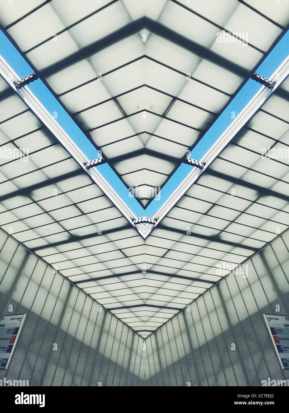 Vertical shot of the ceiling inside a building with beautiful textures ...