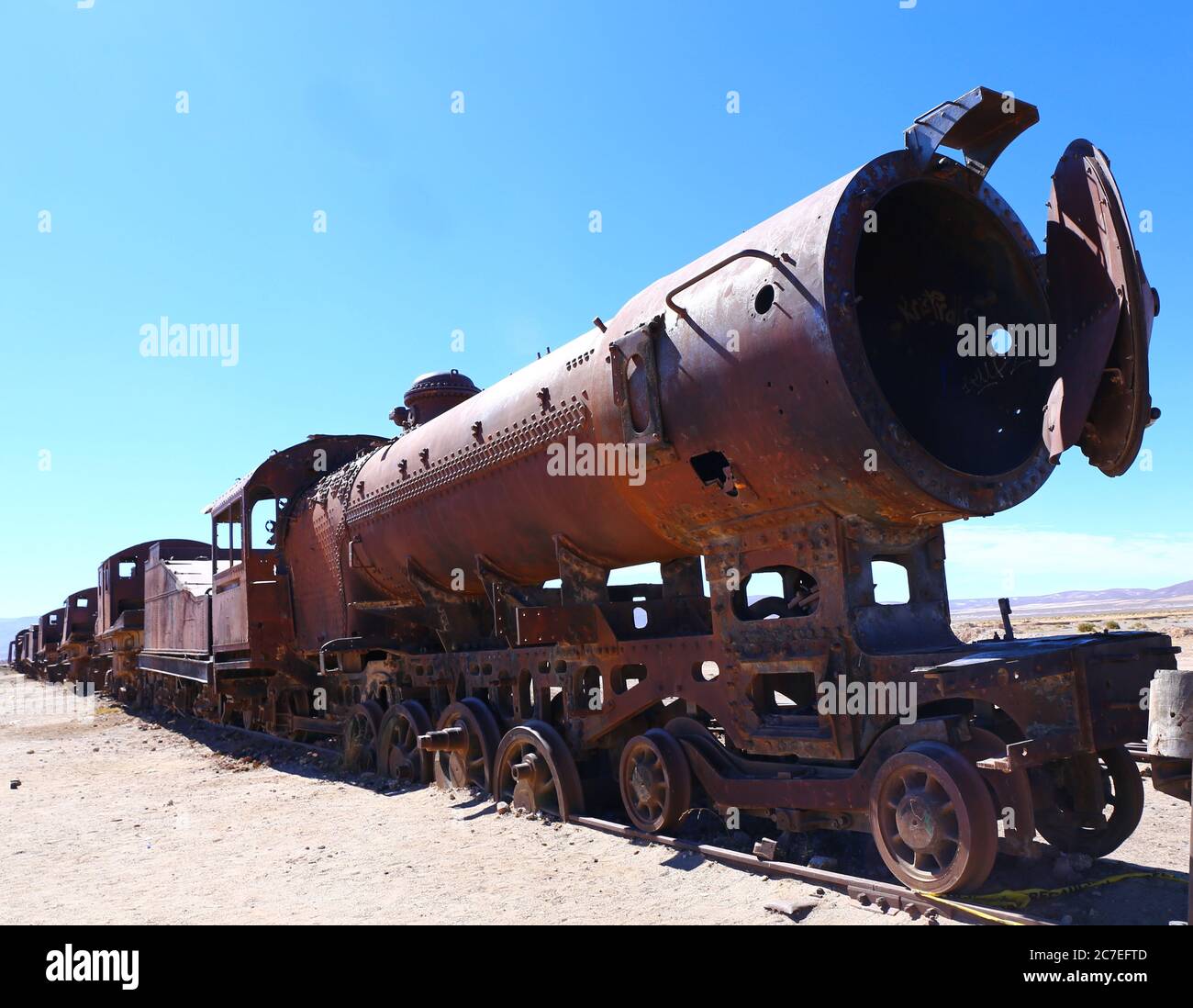 Cemetery of trains in Salar de Uyuni Stock Photo - Alamy
