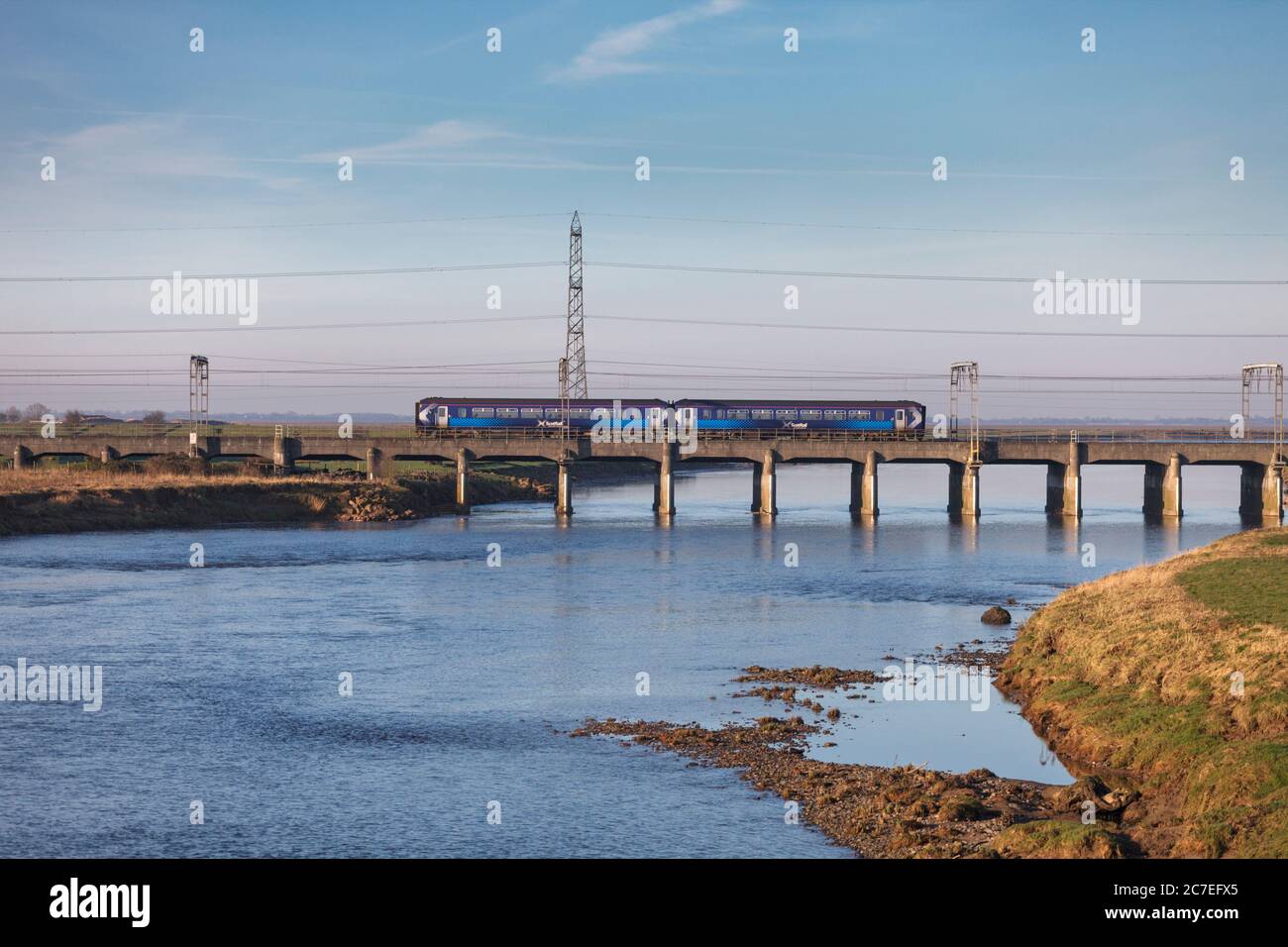 Scotrail class 156 sprinter train crossing the river Esk railway ...