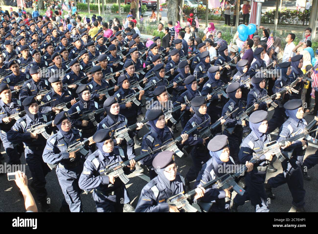 KUALA LUMPUR, MALAYSIA - Aug 31, 2012: Female police officers march on ...