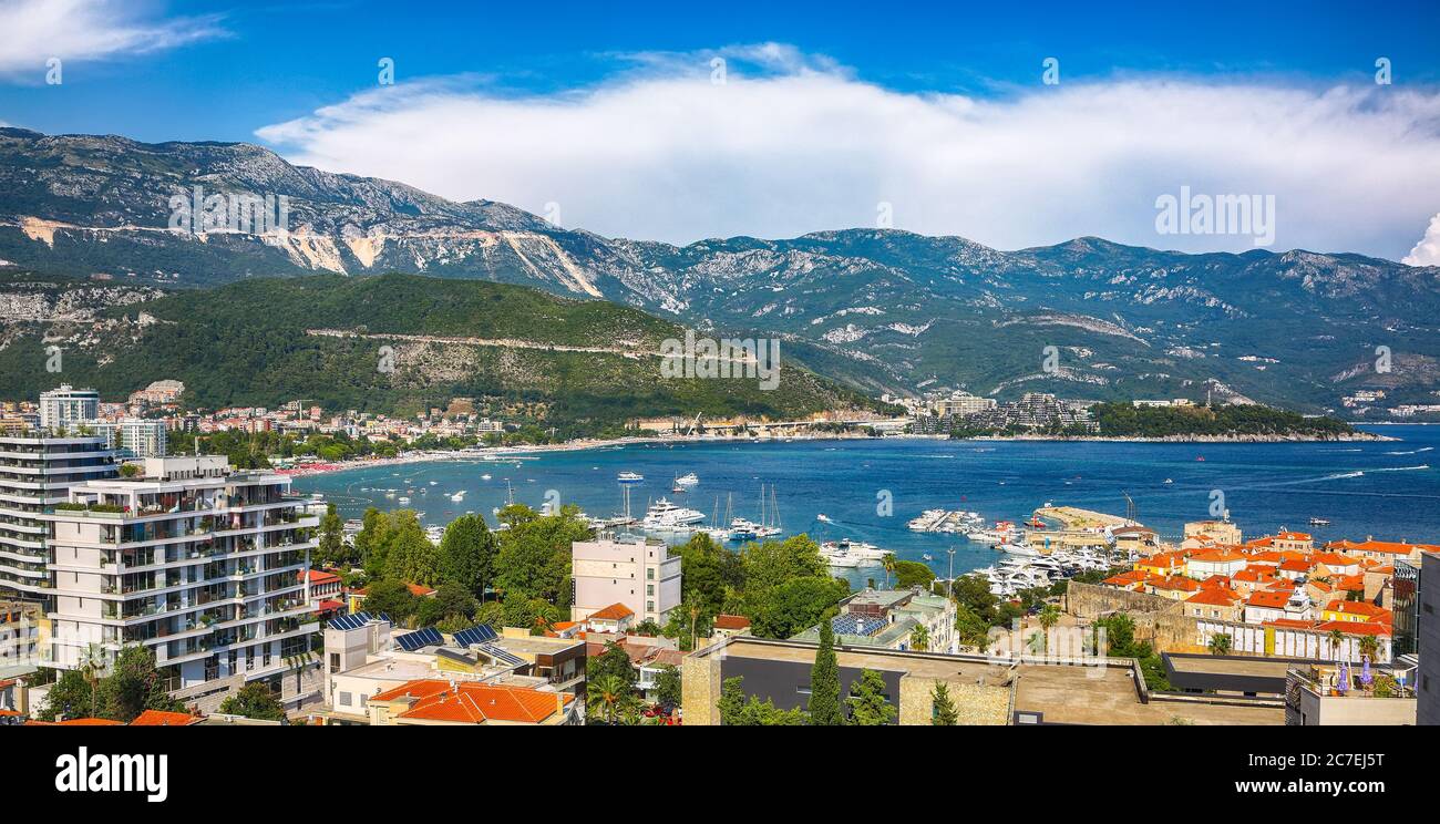 Panoramic summer view of Adriatic sea coast and Budva city with lots of ...