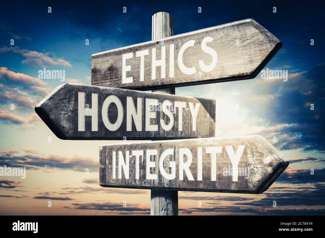 Ethics, honesty, integrity - wooden signpost, roadsign with three ...
