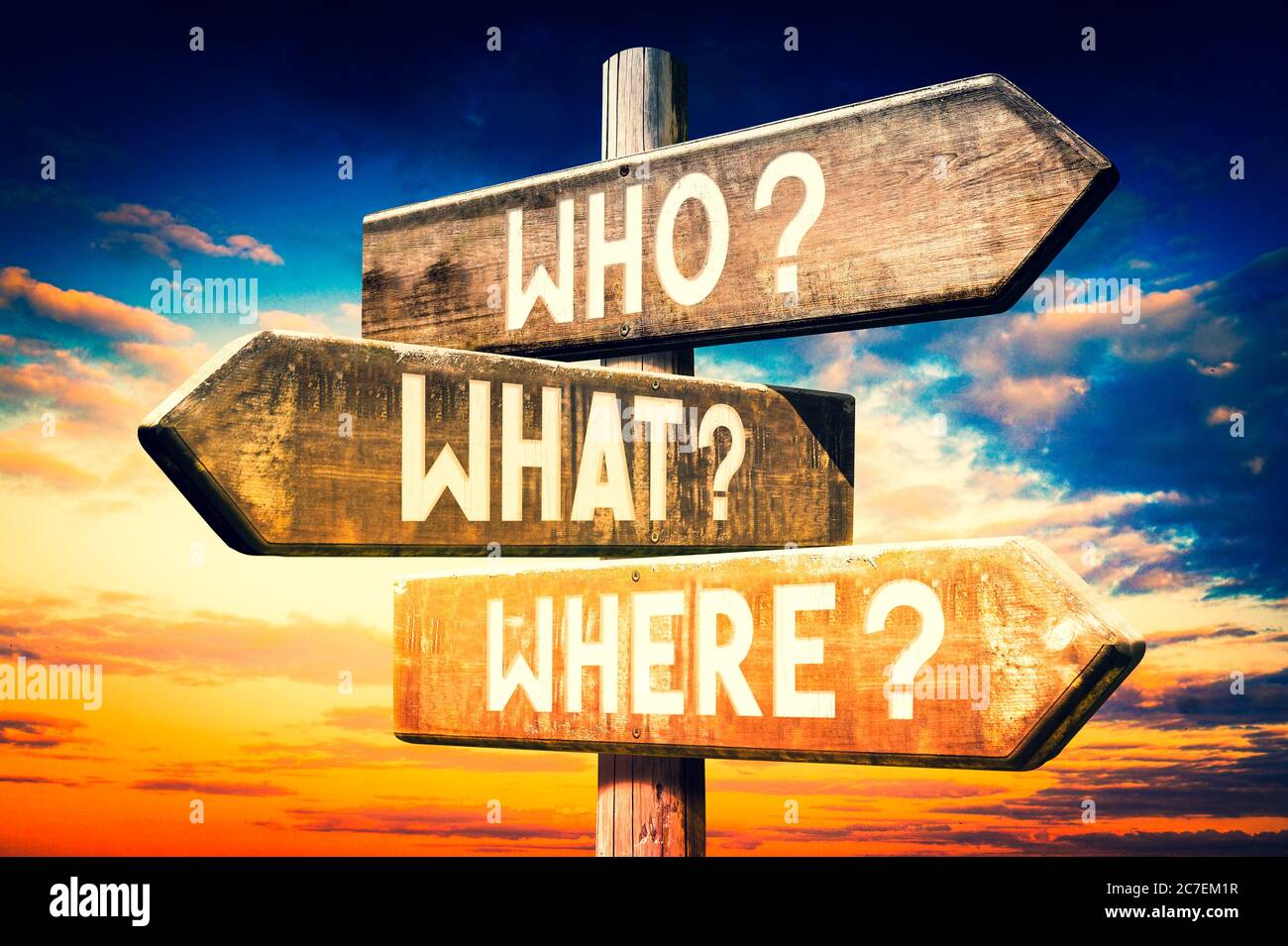 Who? What? Where? - wooden signpost, roadsign with three arrows Stock ...