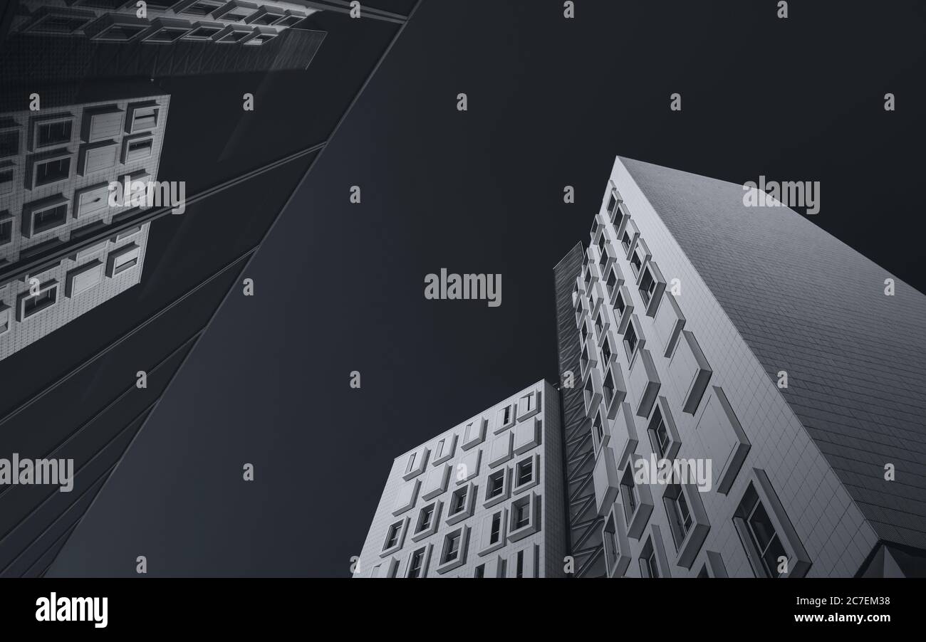 Low angle worm's-eye view shot of modern white buildings with ...