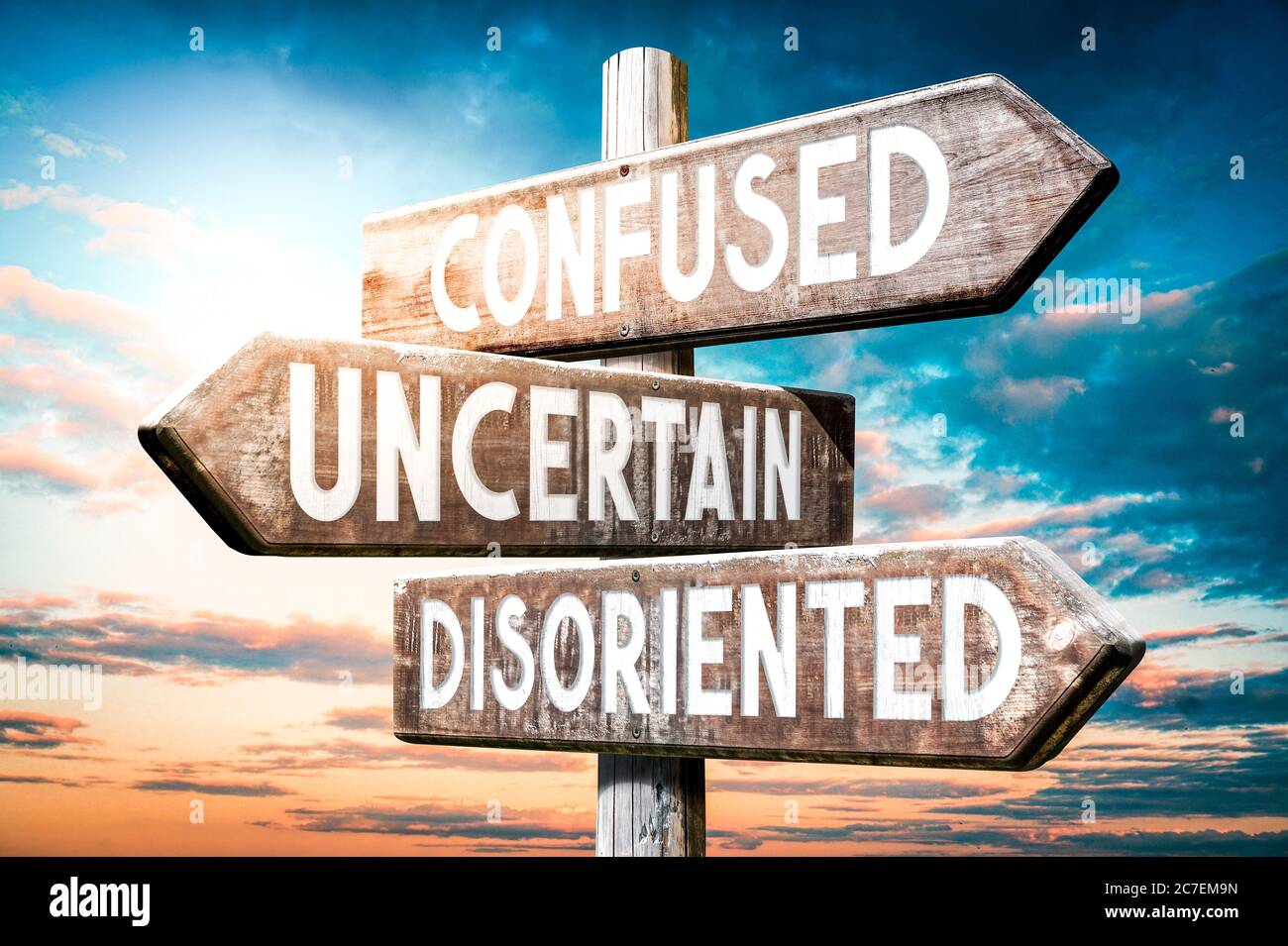 Confused, uncertain, disoriented - wooden signpost, roadsign with three ...