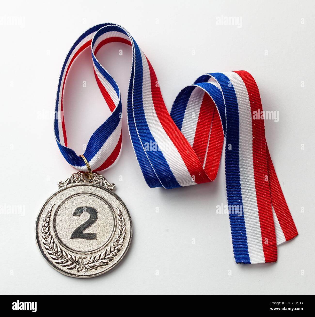 Silver medal. Second place award with ribbon Stock Photo - Alamy