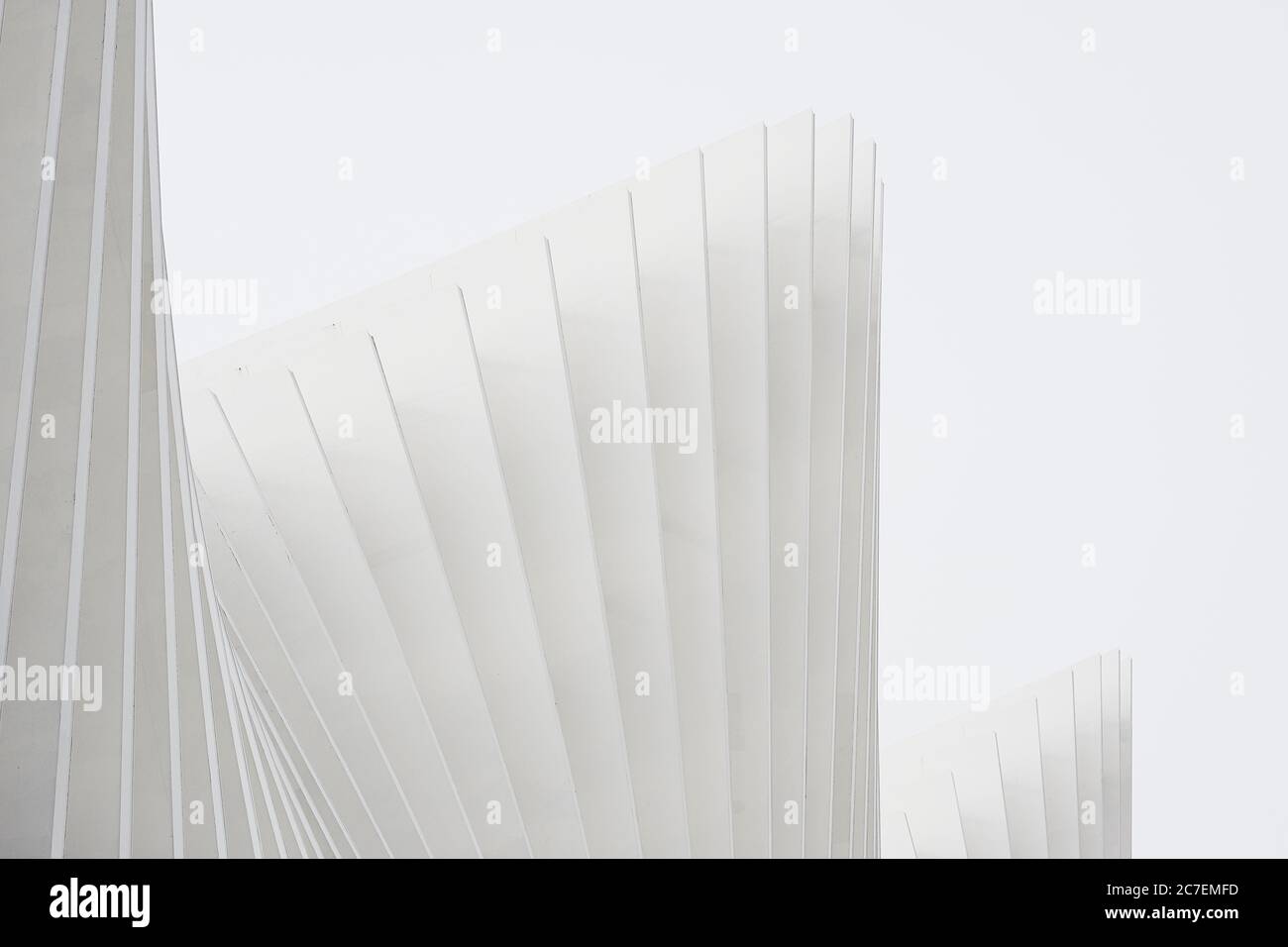 Horizontal shot abstract buildings with white metallic ribs and glass ...