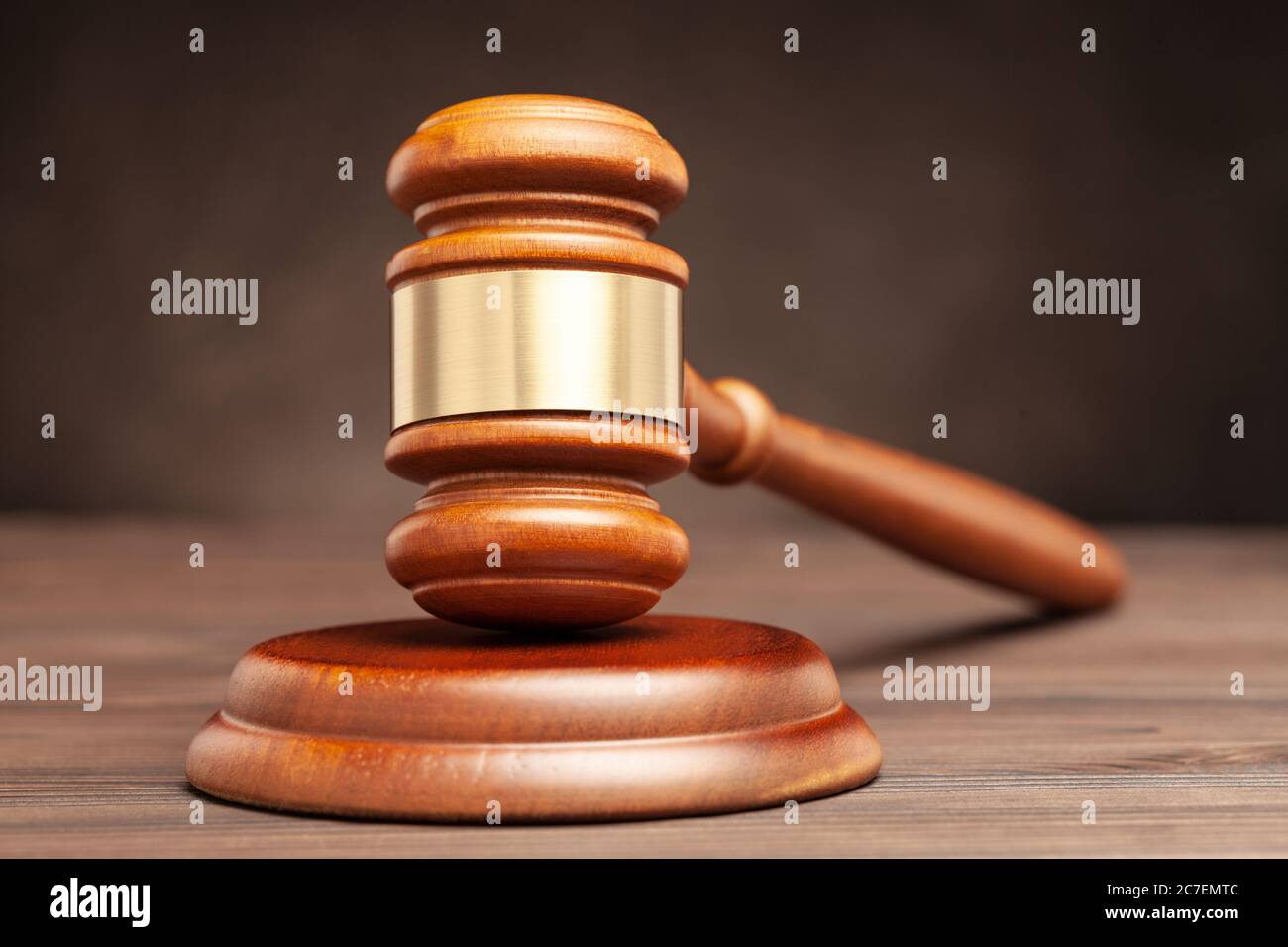 Wooden hammer of the judge. Brown background Stock Photo - Alamy