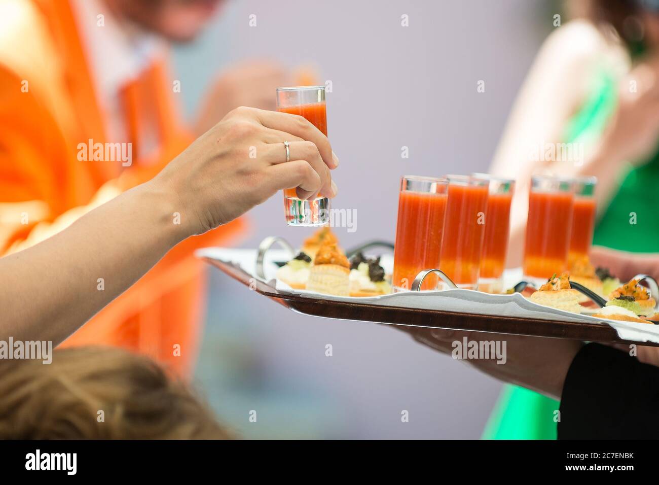 small cocktails and starters being served by the waiter Stock Photo - Alamy