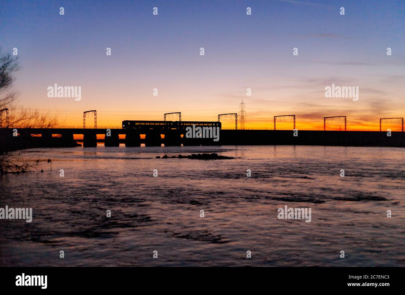 Scotrail class 156 sprinter train crossing the river Esk railway ...