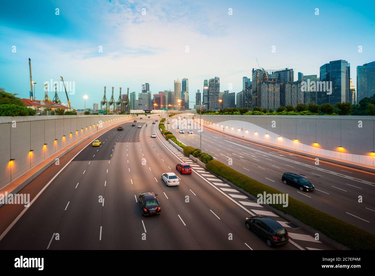 Busy road and city background during rush hour with motion-blurred ...