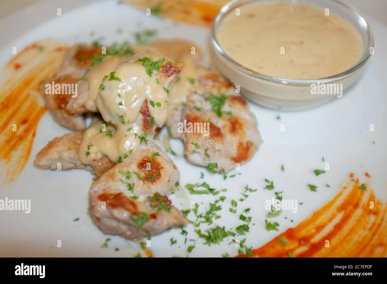 Closeup shot of Spider Pork Dish popular in France with a sauce and ...