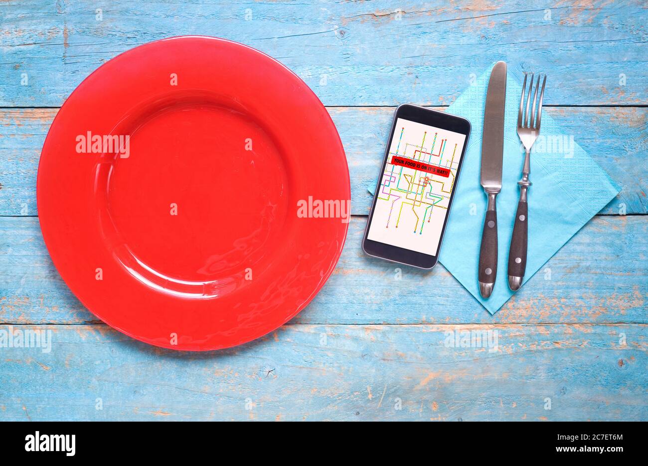 Food delivery concept, smartphone,plate,cutlery,delivery message on ...