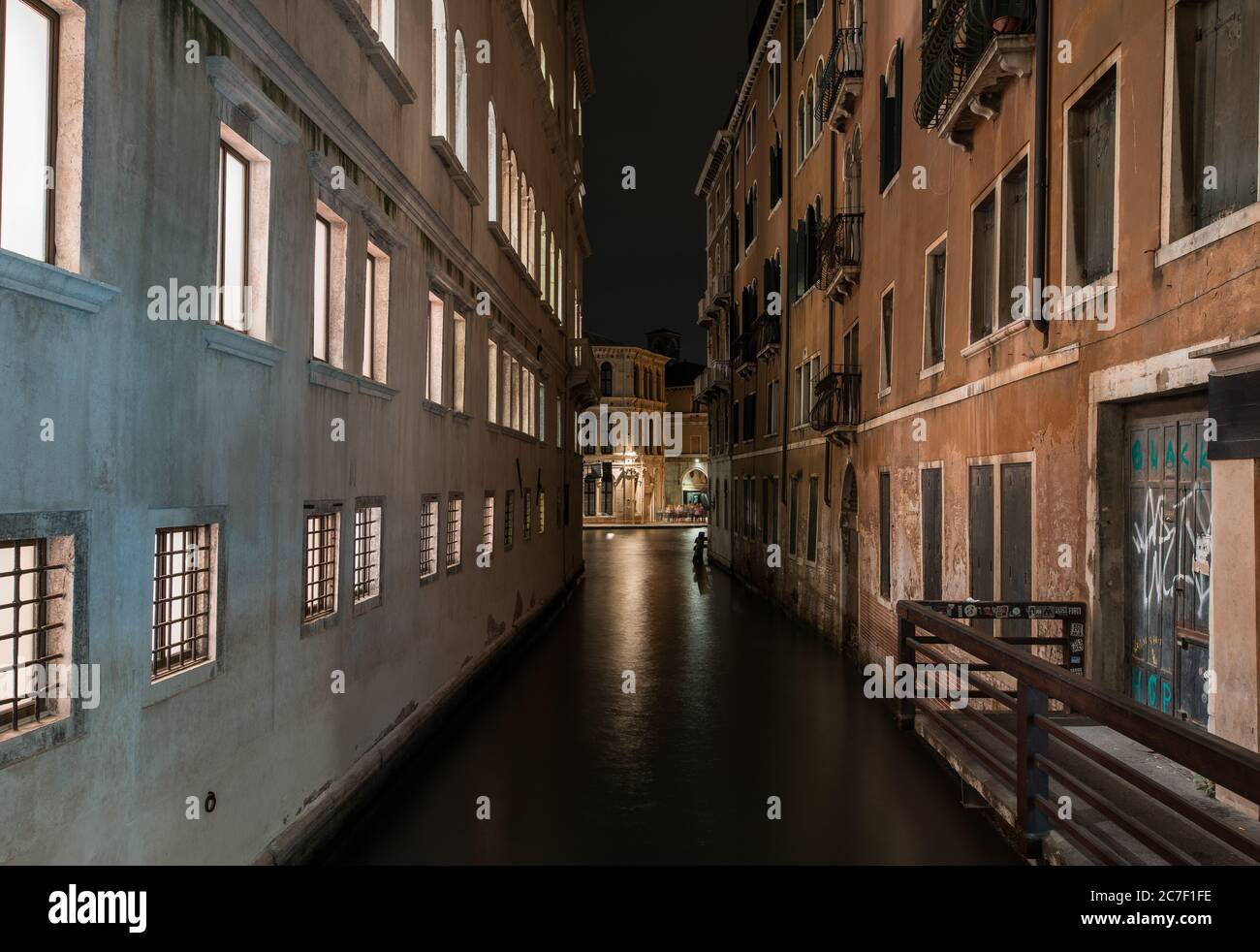 Horizontal shot of a river between old buildings with beautiful ...