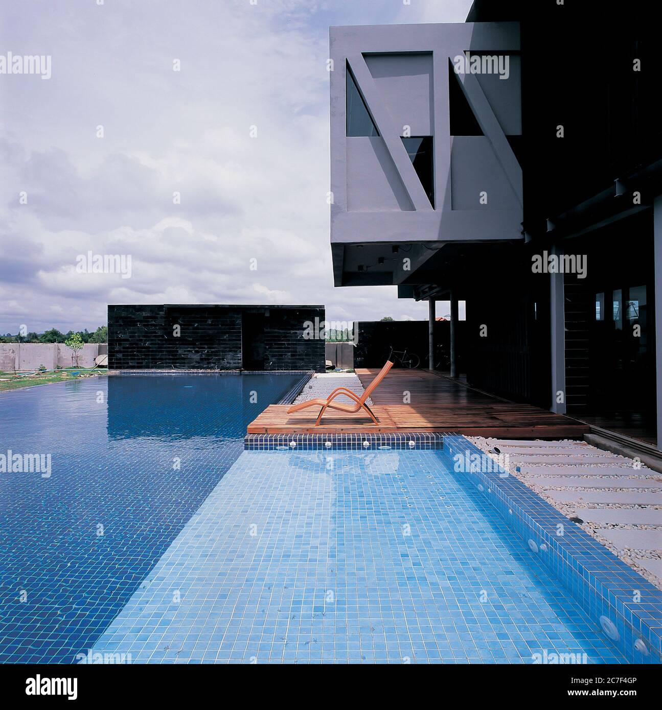deck chair on the wood desk , pool view in the modern house.tif Stock ...