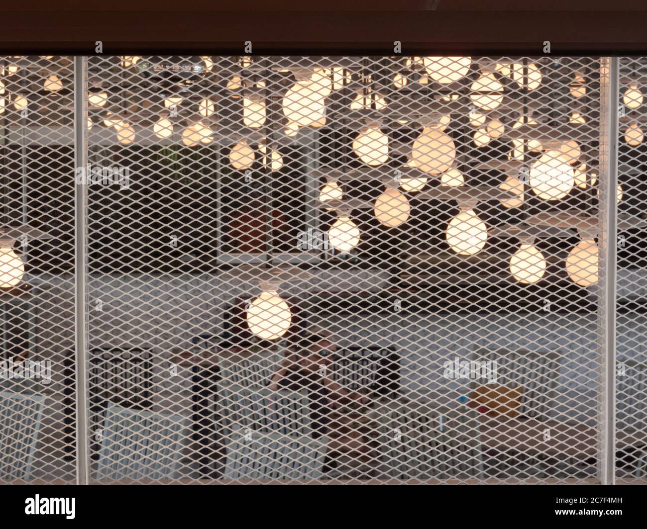 Wire net , on many electric lights background Stock Photo - Alamy