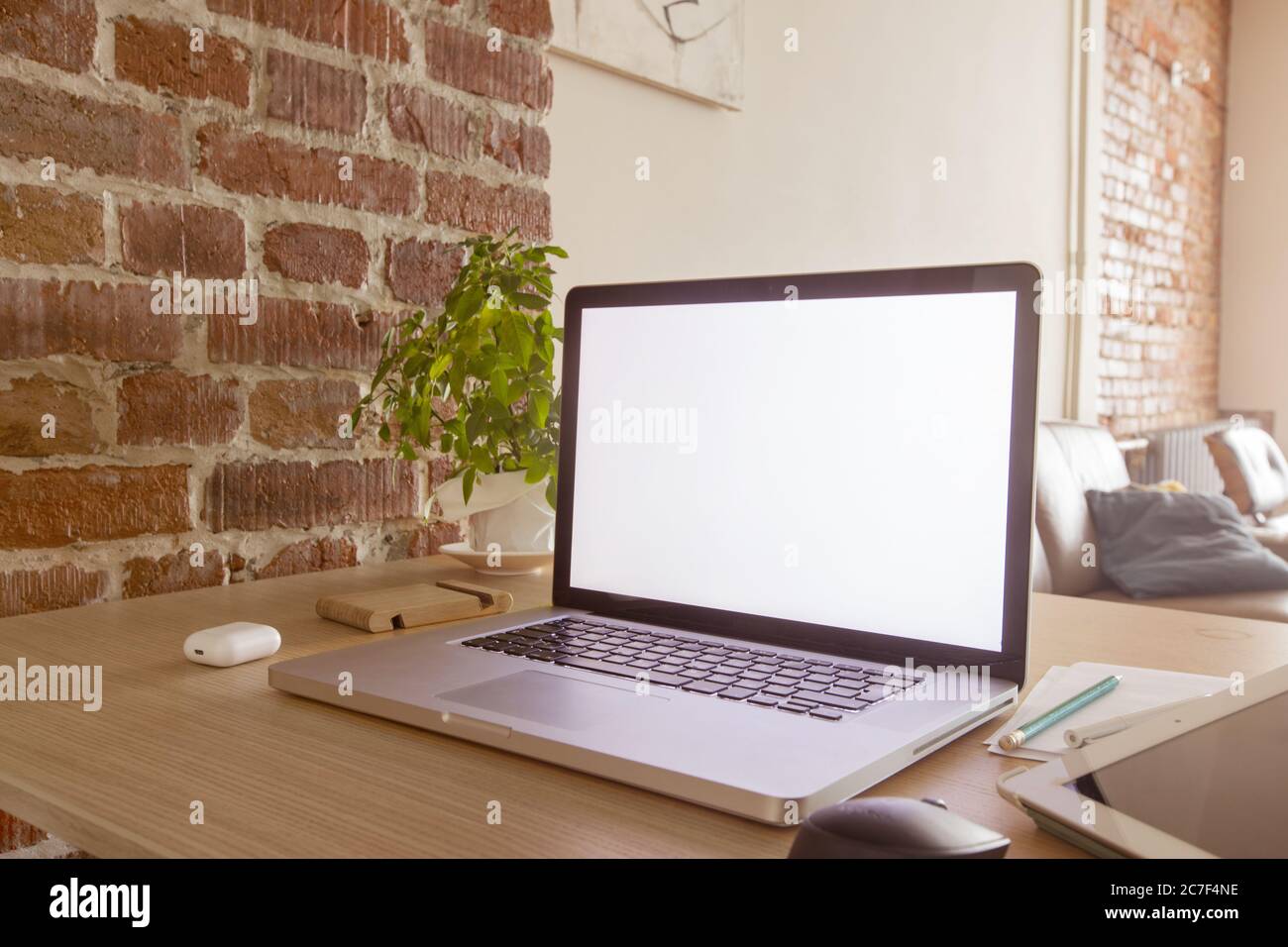 Workplace desk with laptop nobody home Stock Photo - Alamy
