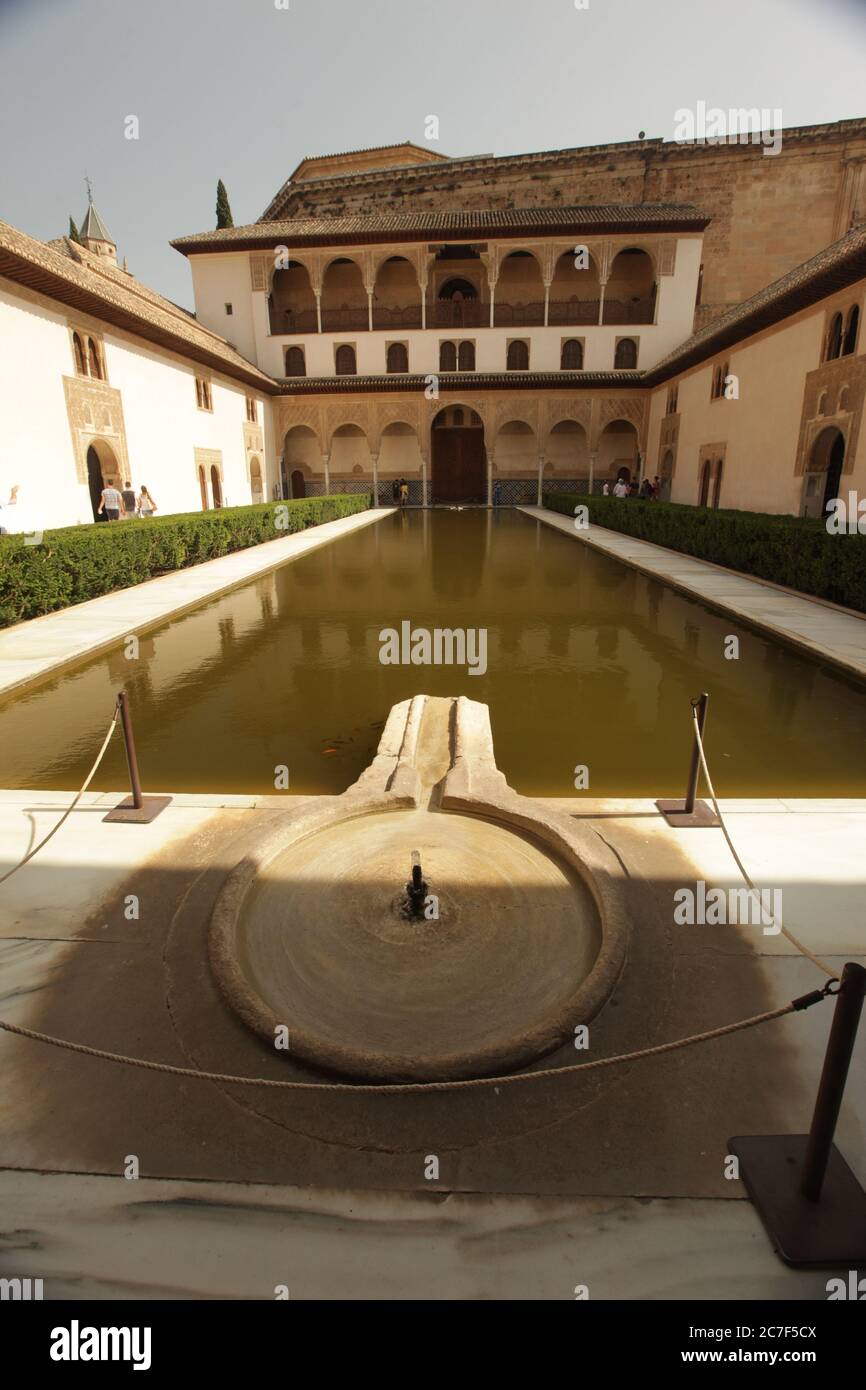 Ancient fortress with a pool and water fountains in Spain, Alhambra ...