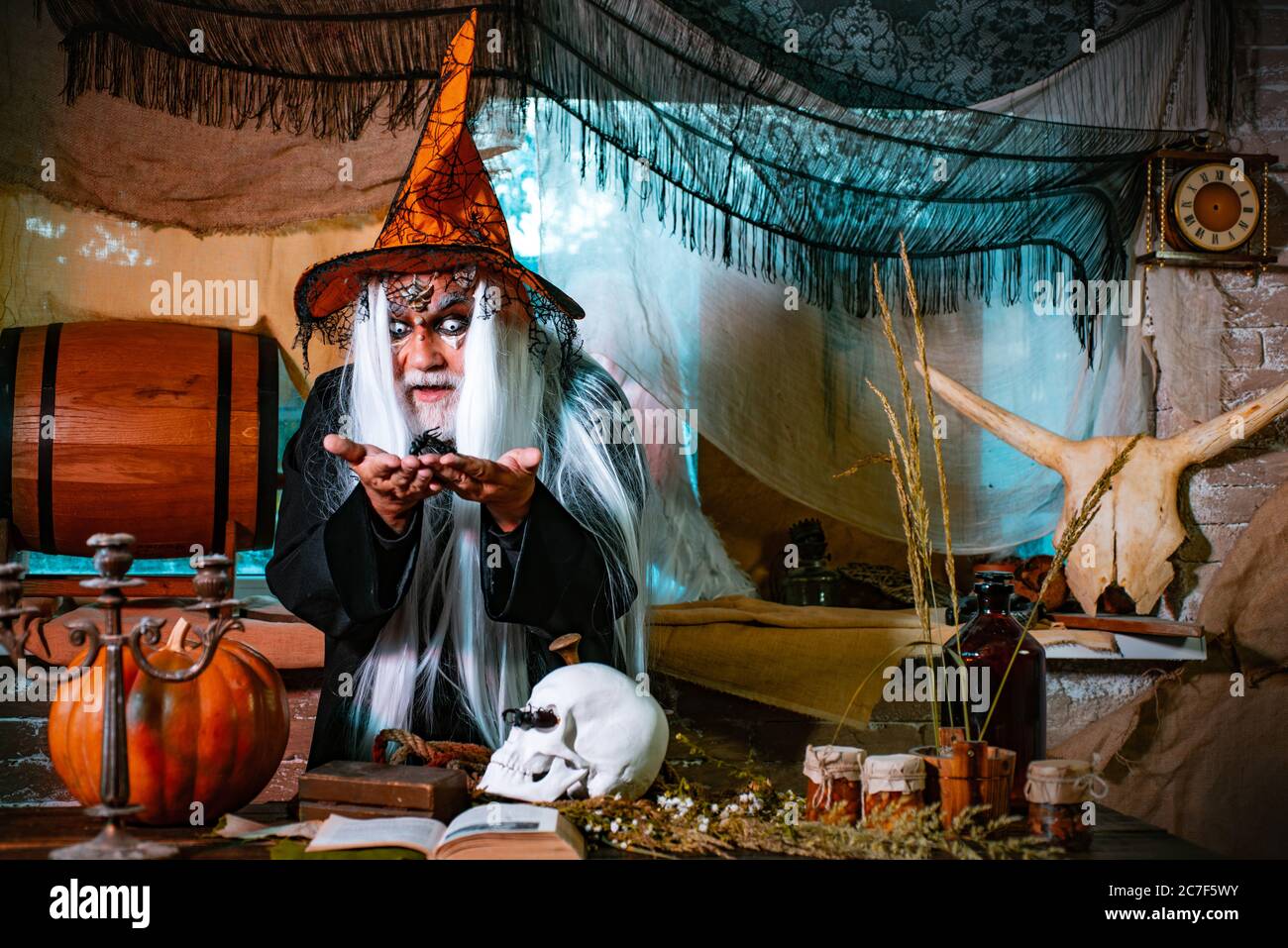Happy Halloween - handsome Demon isolated on dark background. The crazy ...