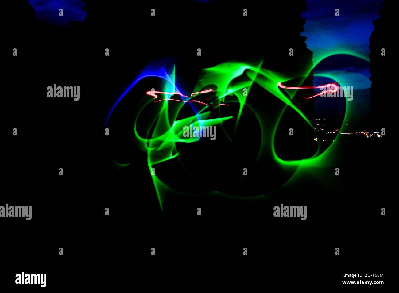 Time lapse shot of cool green and blue light at night time Stock Photo ...