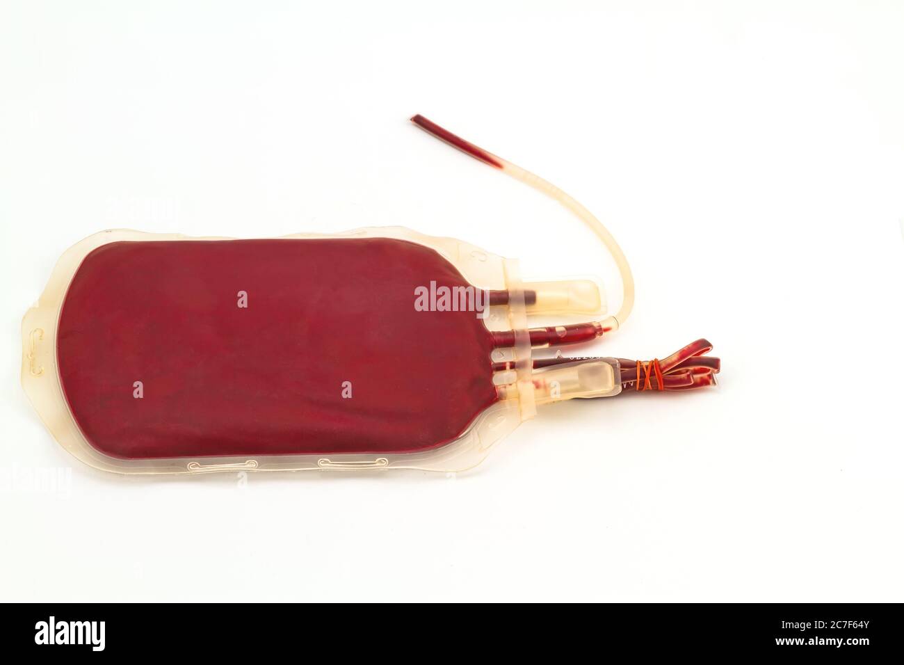 Close up back side bag of blood and plasma group A and rubber tube ...