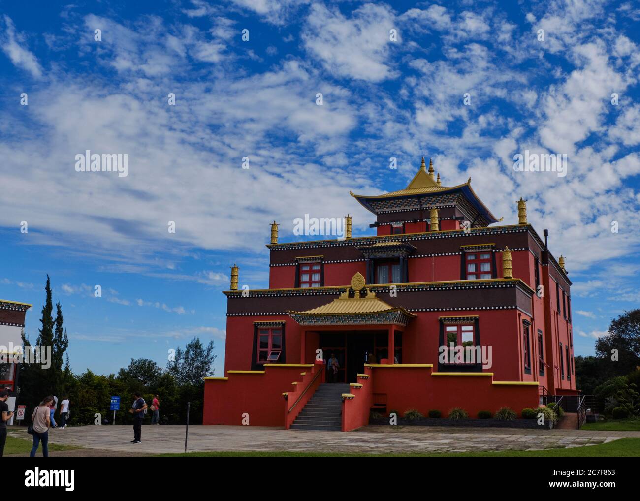 Beautiful Chagdud Gonpa BuddhistTemple captured under the blue sky in ...