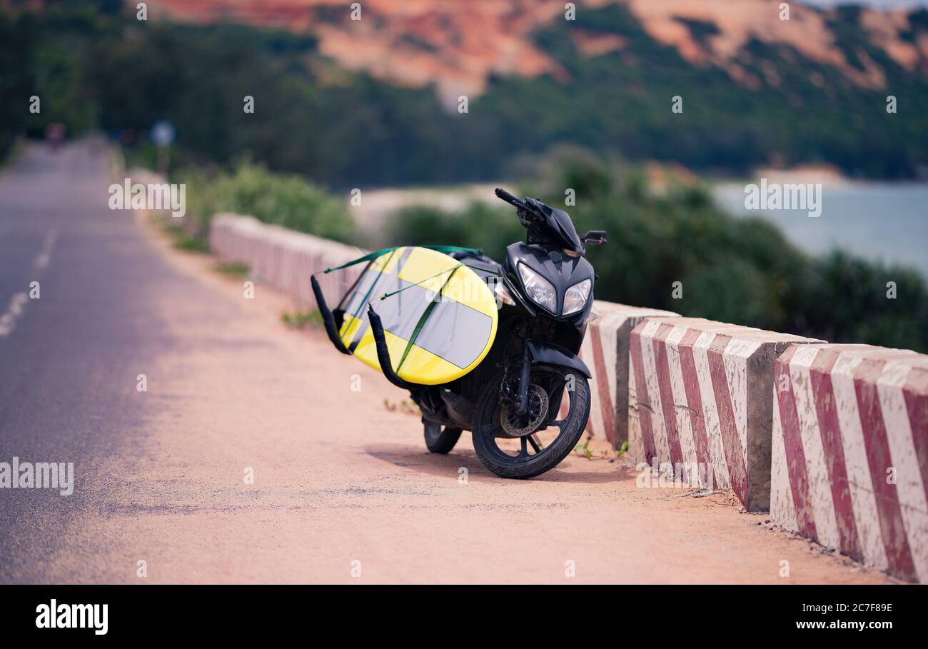 Motorbike with surfboard hi-res stock photography and images - Alamy