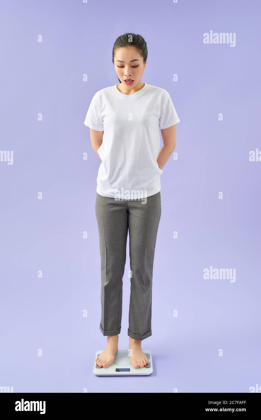 Woman sad scales hi-res stock photography and images - Alamy